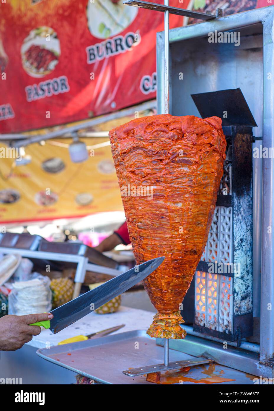 Meat trompo for tacos al pastor. Mexican street food. Marinated meat al ...