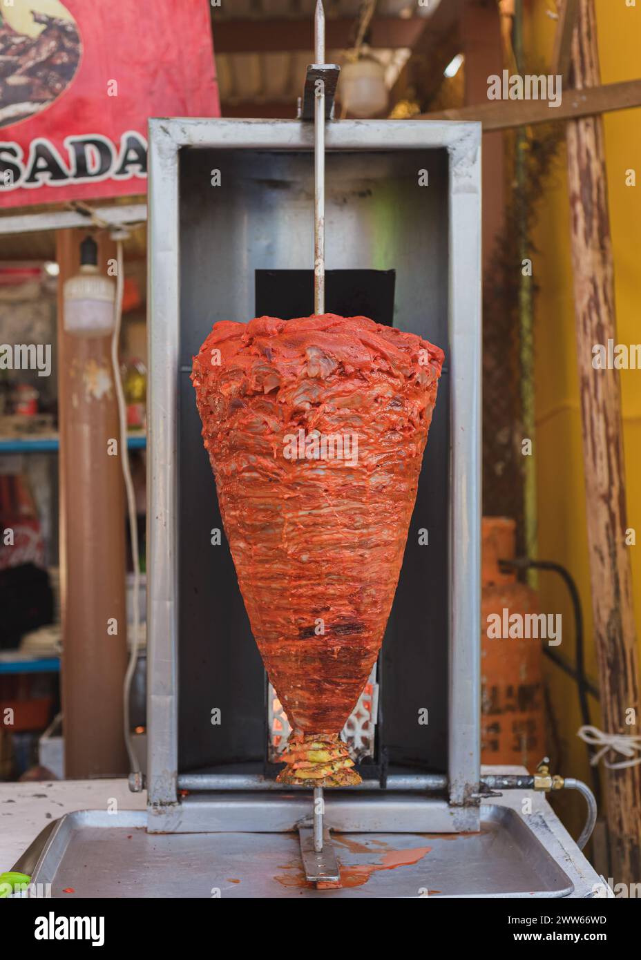 Meat trompo for tacos al pastor. Mexican street food. Marinated meat al ...