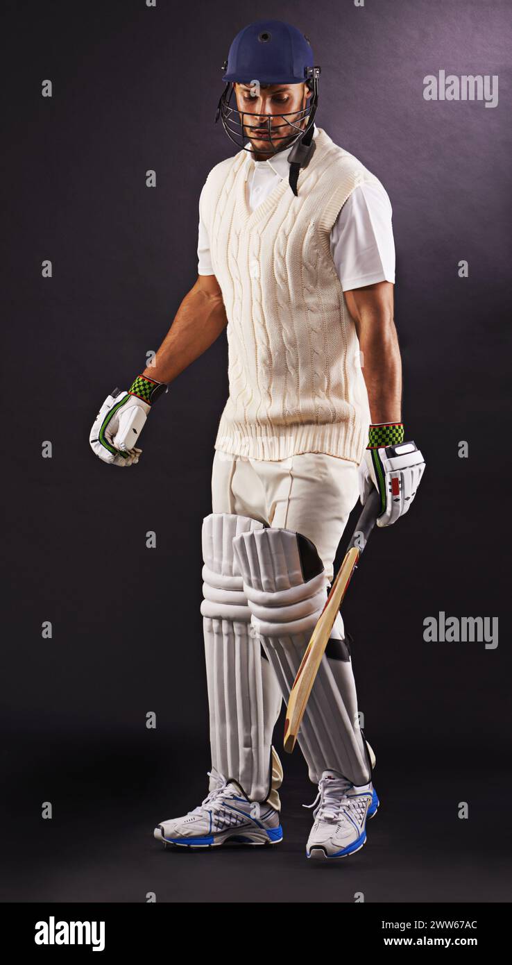 Man, cricket and athlete for sports exercise in studio for professional ...