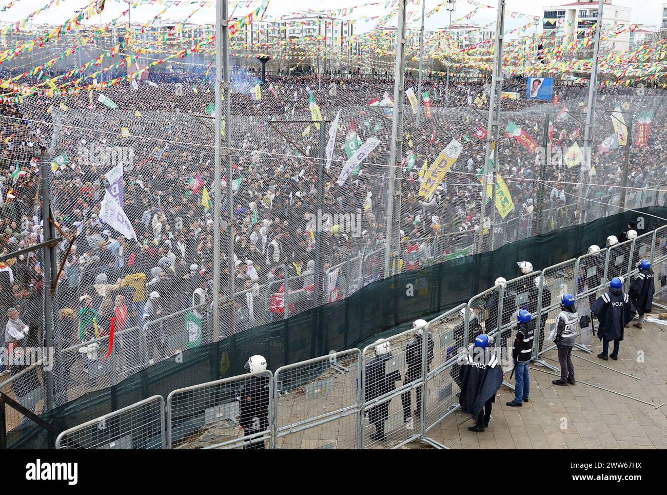 A 5-meter-high wire mesh and police barrier placed between the ...
