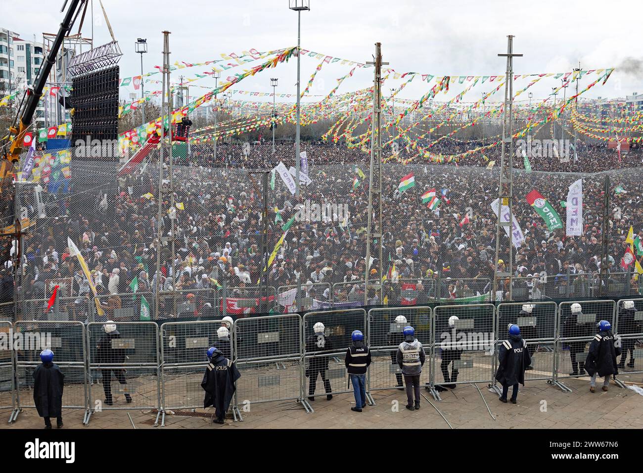 A 5-meter-high wire mesh and police barrier placed between the ...