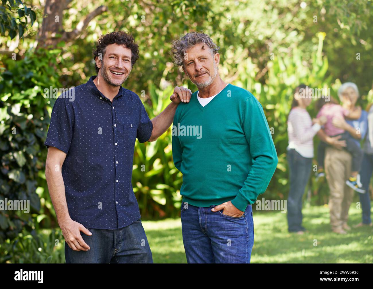 Man, dad and smile with embrace for bonding, affection and love to ...