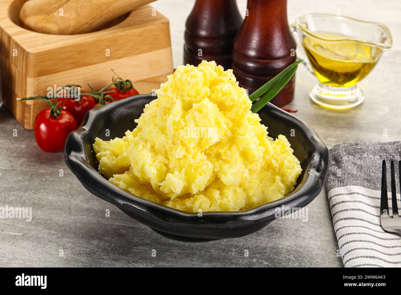 Mashed potato Puree with butter served green onion Stock Photo - Alamy