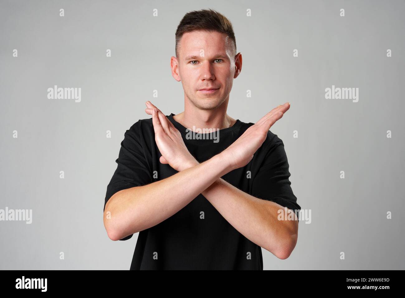 Man making x with arms hi-res stock photography and images - Alamy
