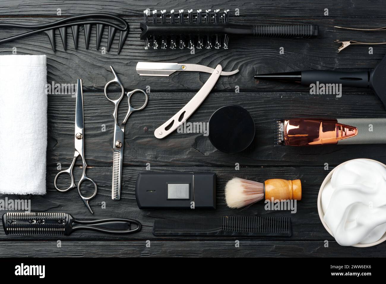 Professional Barber Tools Laid Out on Dark Wooden Surface Stock Photo ...