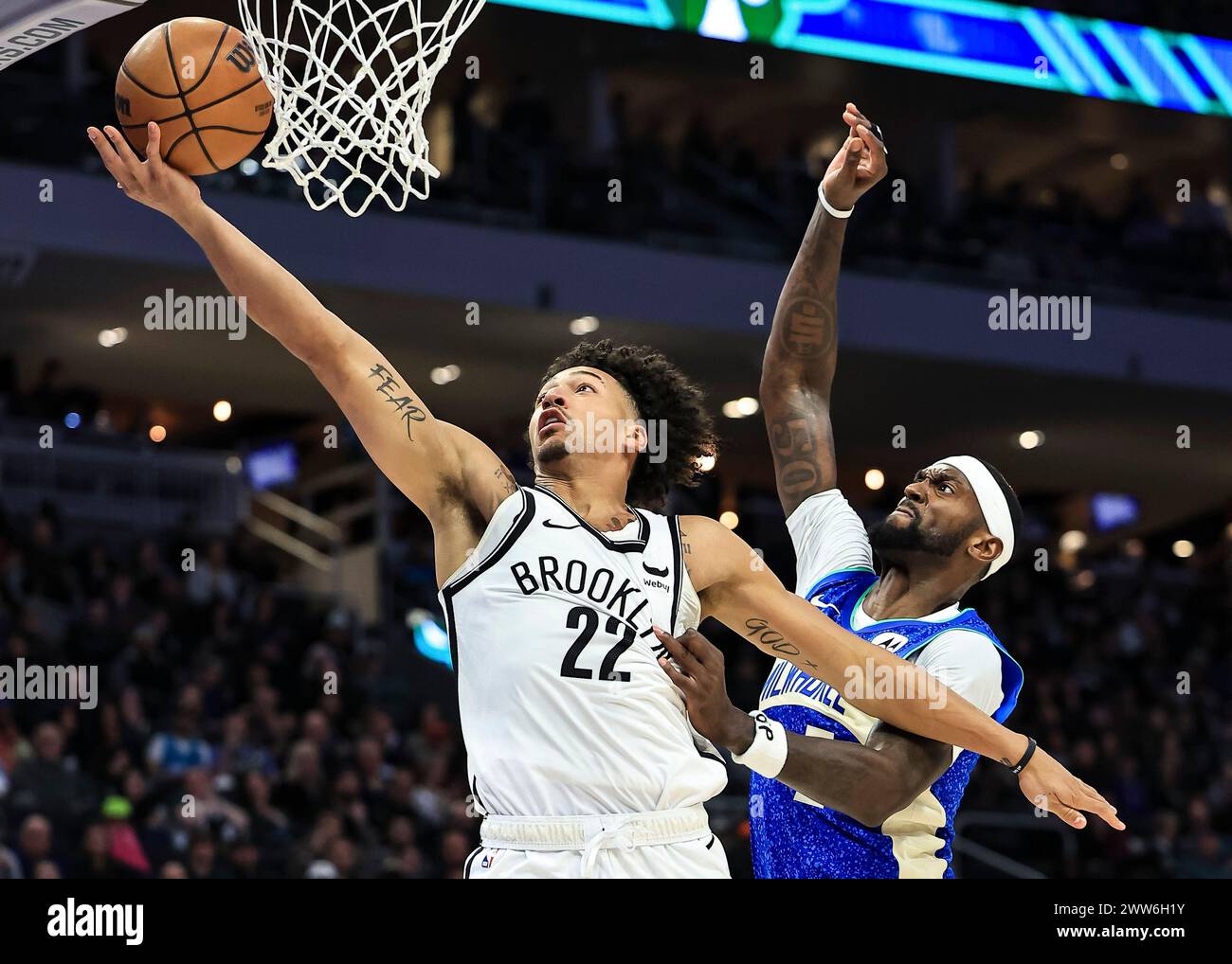 Milwaukee, USA. 21st Mar, 2024. Brooklyn Nets forward Jalen Wilson (L ...
