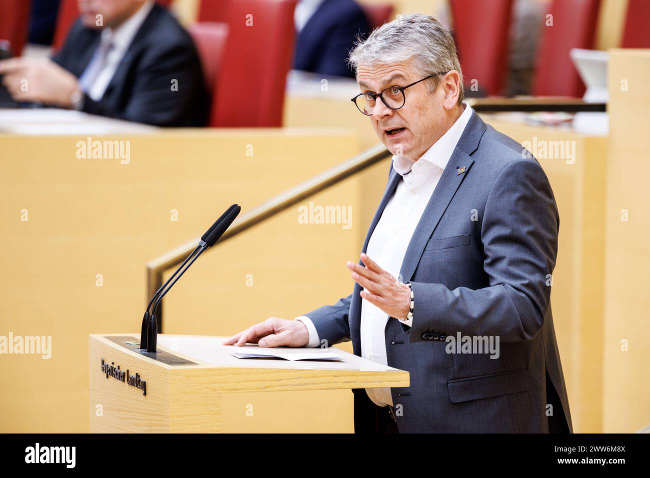 Munich, Germany. 21st Mar, 2024. Martin Scharf (Free Voters) speaks at ...