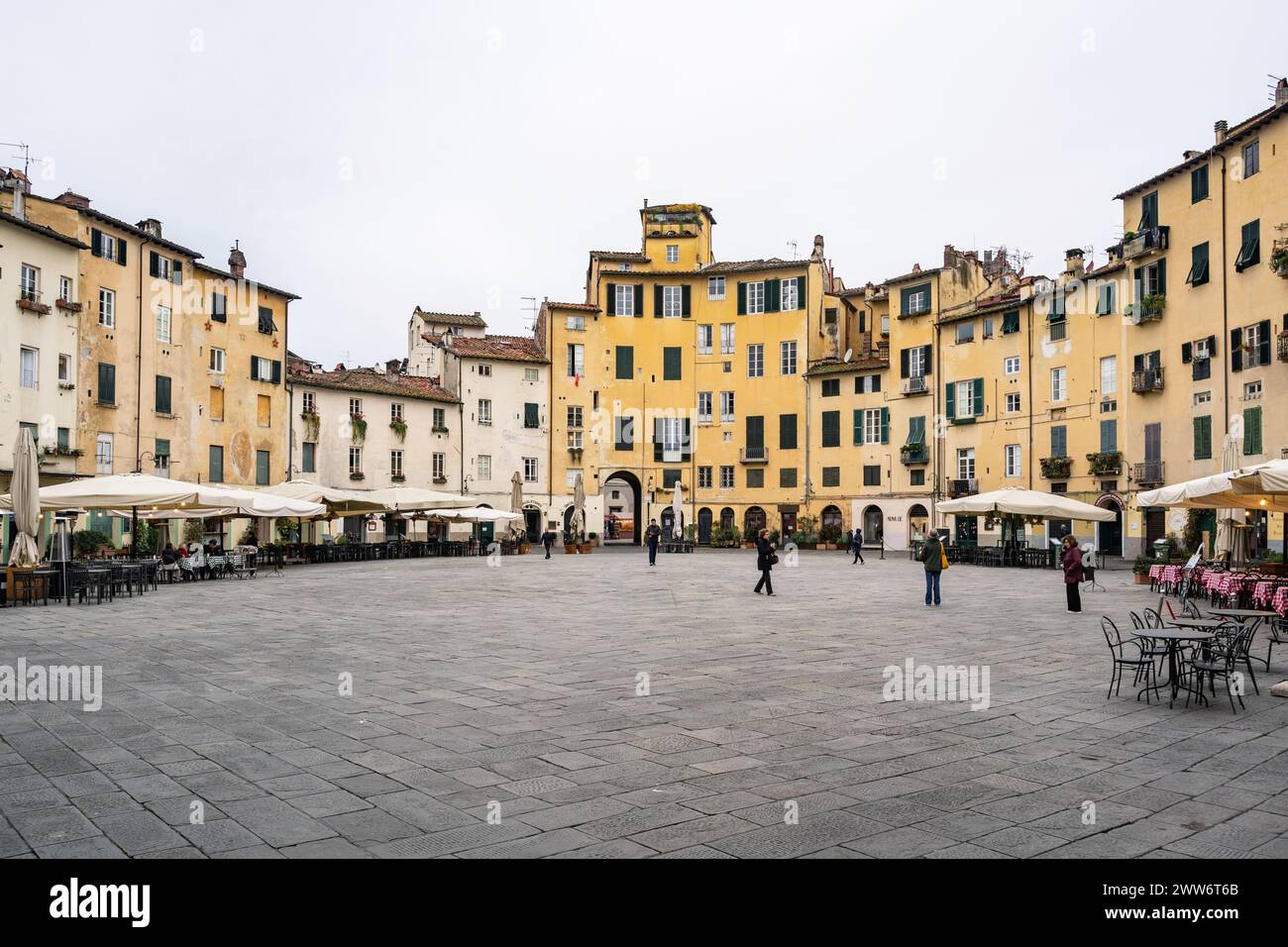 Piazza dell Anfiteatro the heart of the city of Lucca, Italy Stock ...