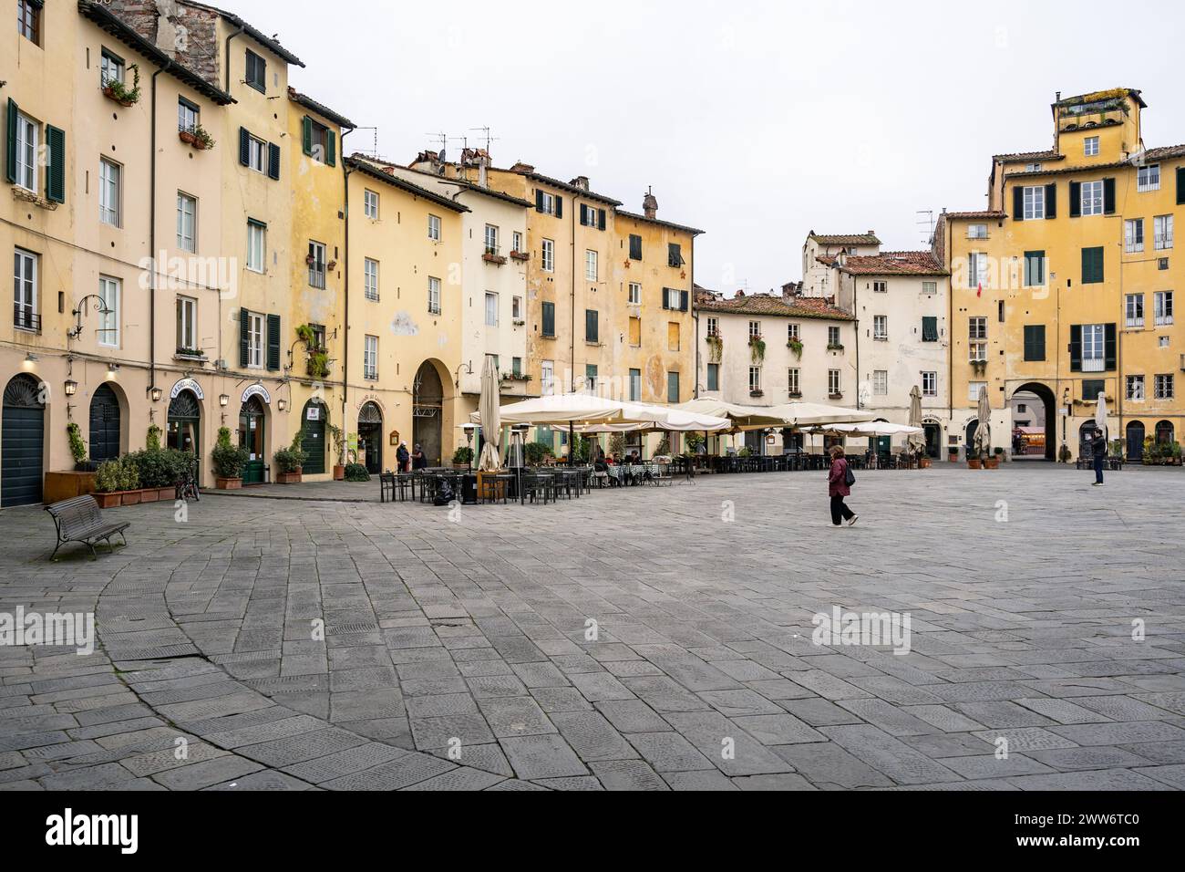 Piazza dell Anfiteatro the heart of the city of Lucca, Italy Stock ...