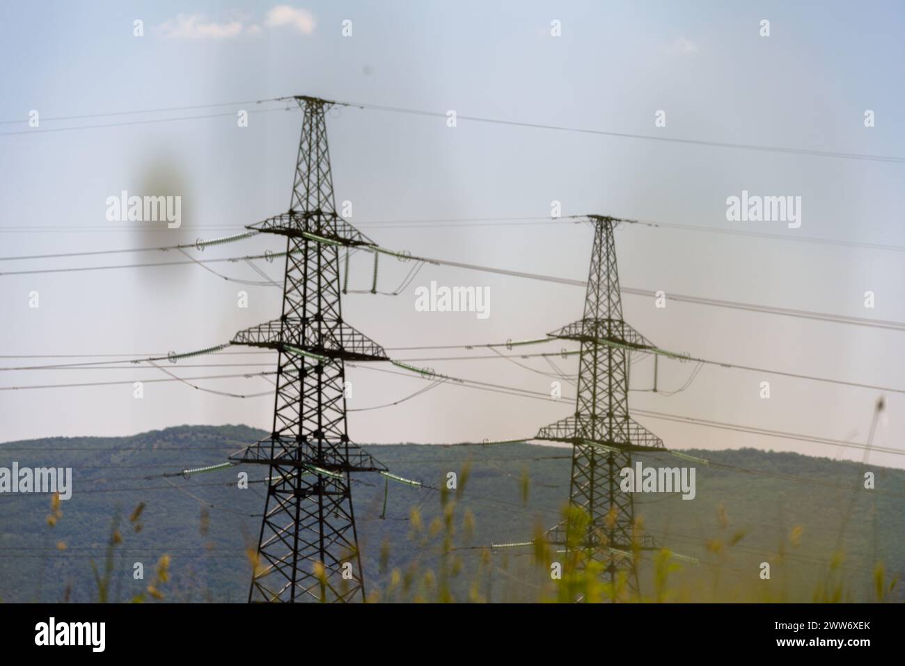 High voltage towers Electric pole. Power line support with wires for ...