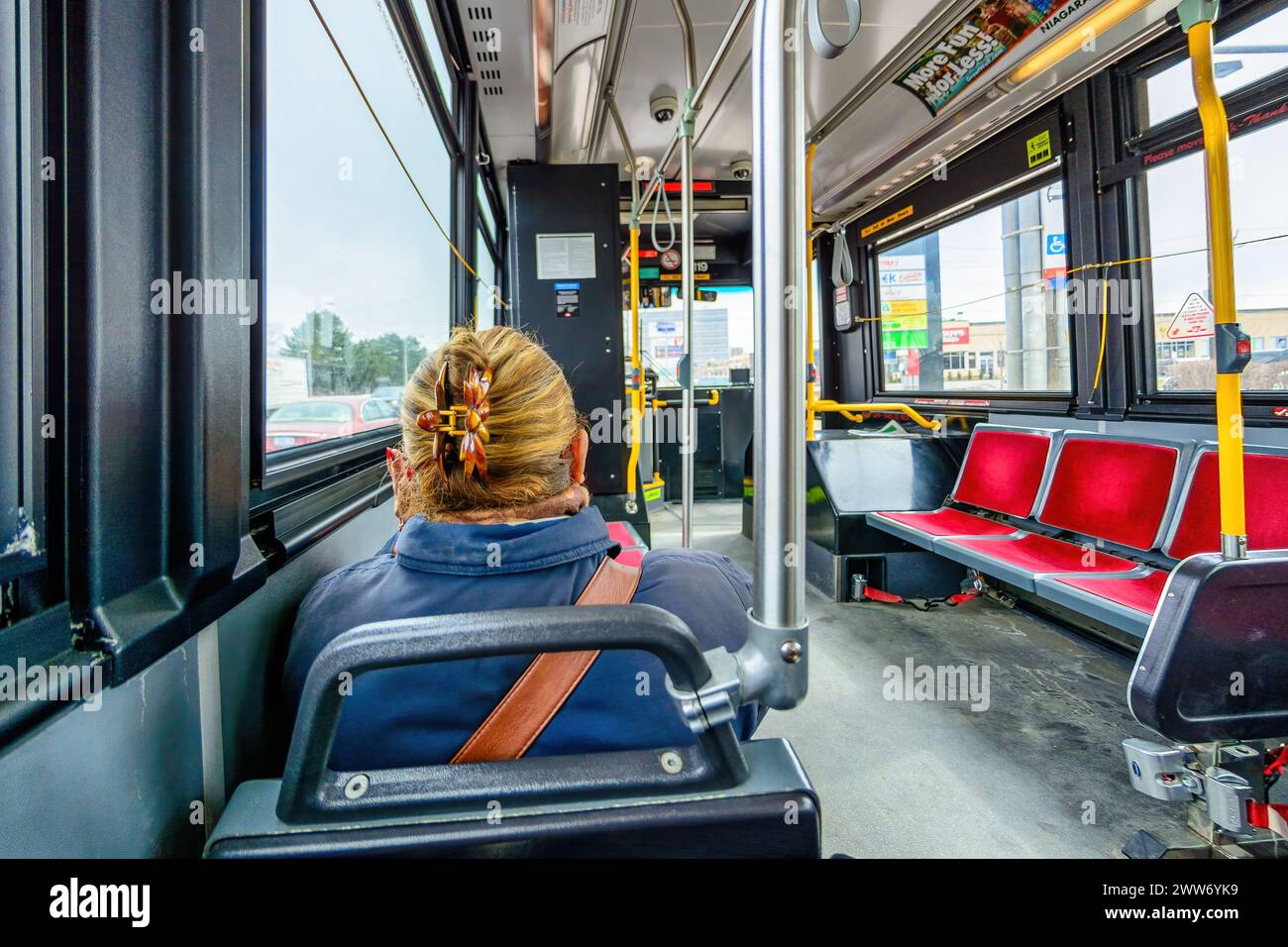 woman on an empty ttc bus, toronto, canada Stock Photo - Alamy