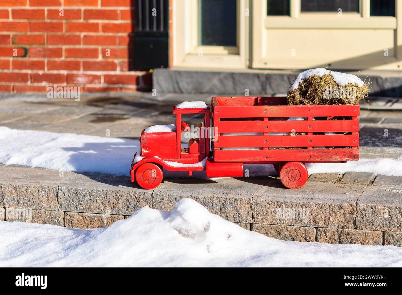 Homemade wood toy decorating a house doorstep, Toronto, Canada Stock ...