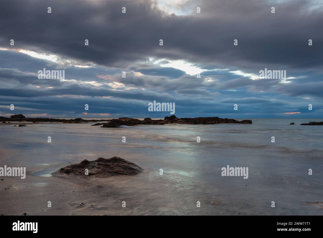 Sunset on the beach under the Covesea Skerries,Lighthouse,Lossiemouth ...