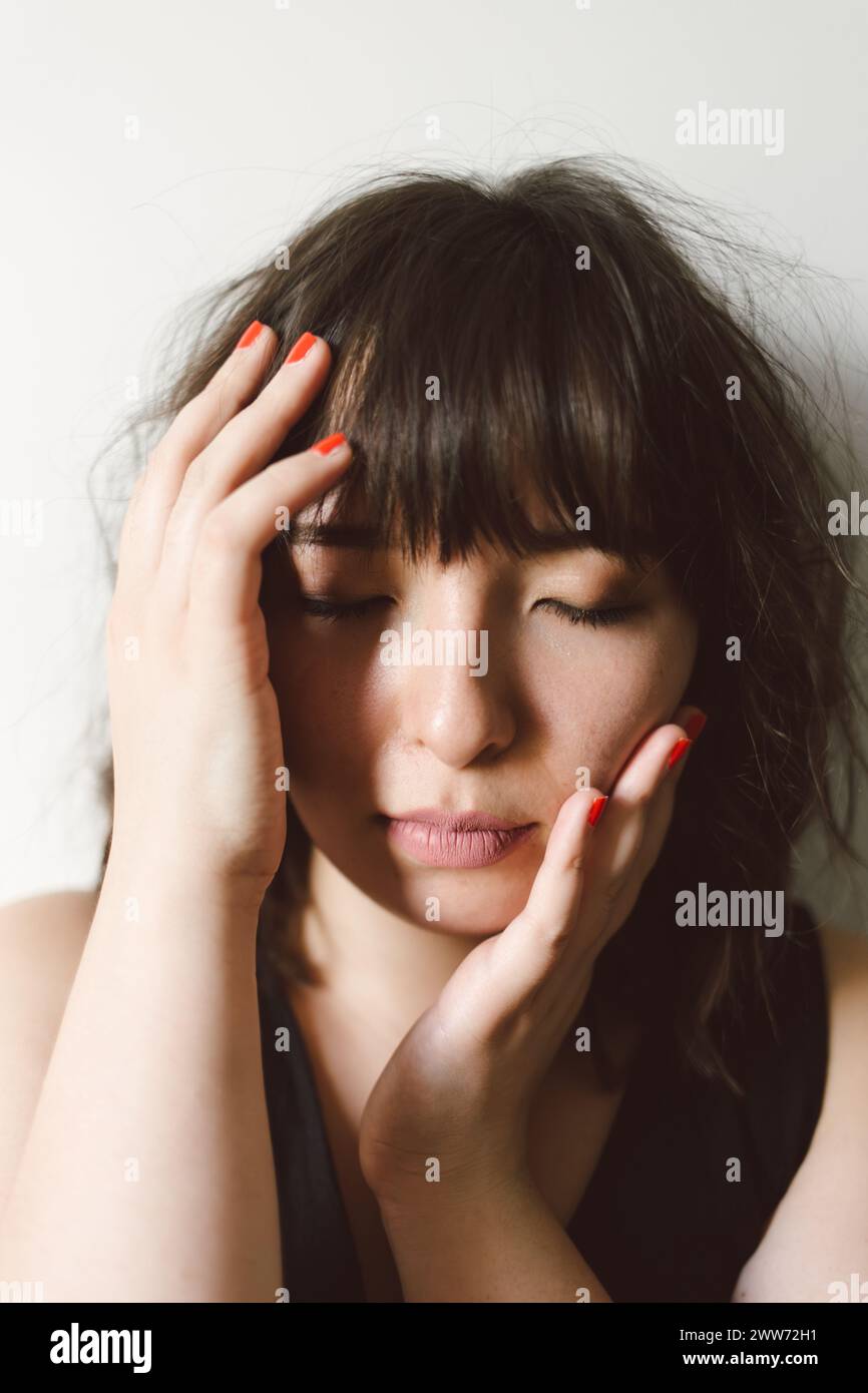 Tender model closing eyes hi-res stock photography and images - Alamy
