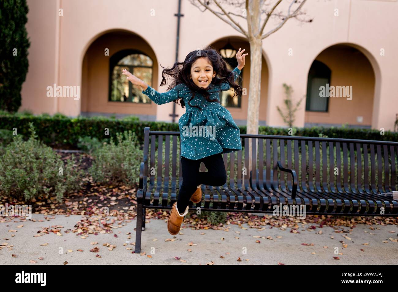 Six Year Old Jumping Off Bench in San Diego Stock Photo - Alamy