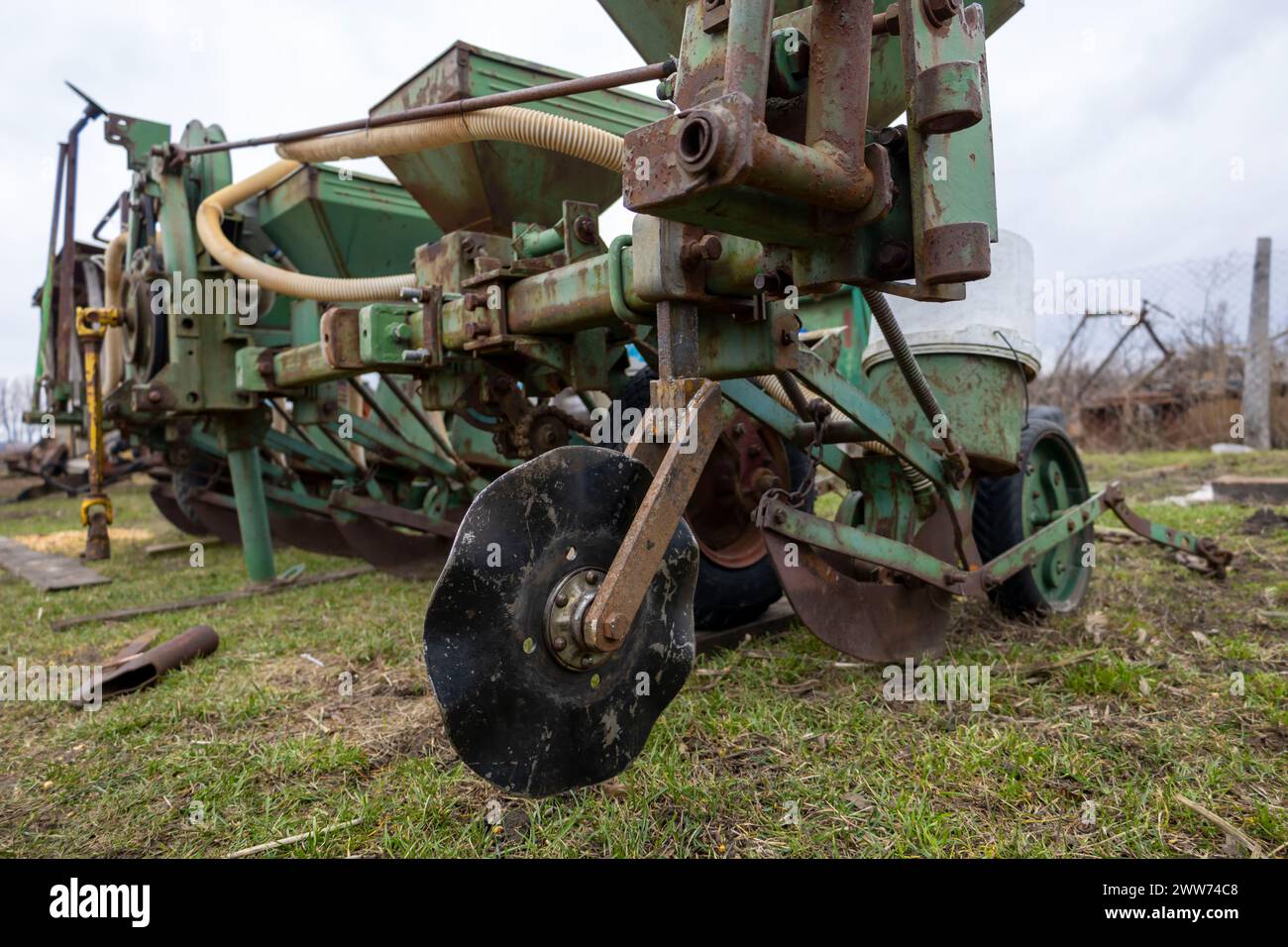 Old green planter for corn Stock Photo - Alamy