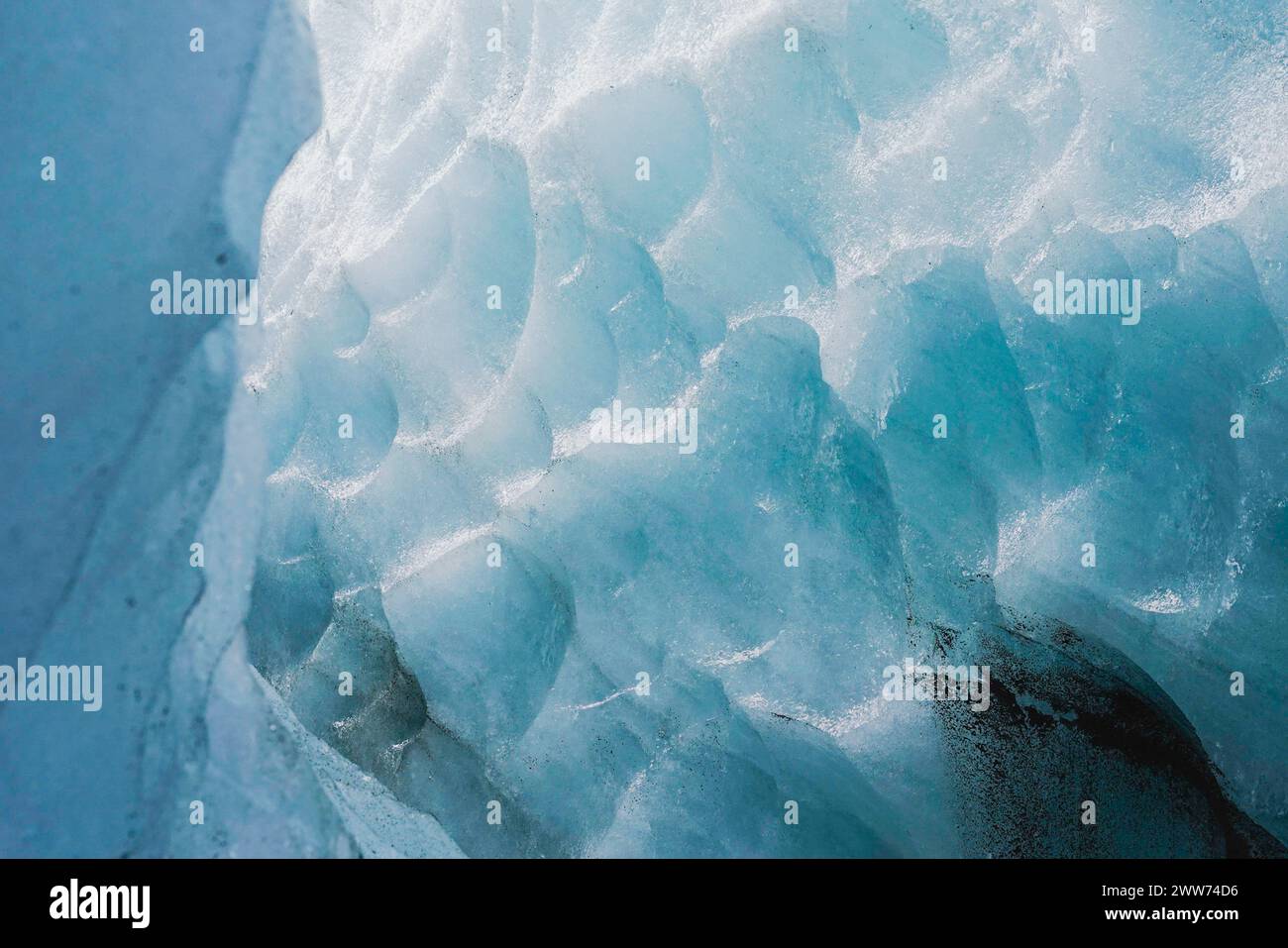 Textured blue ice wall from inside an Icelandic glacier Stock Photo - Alamy