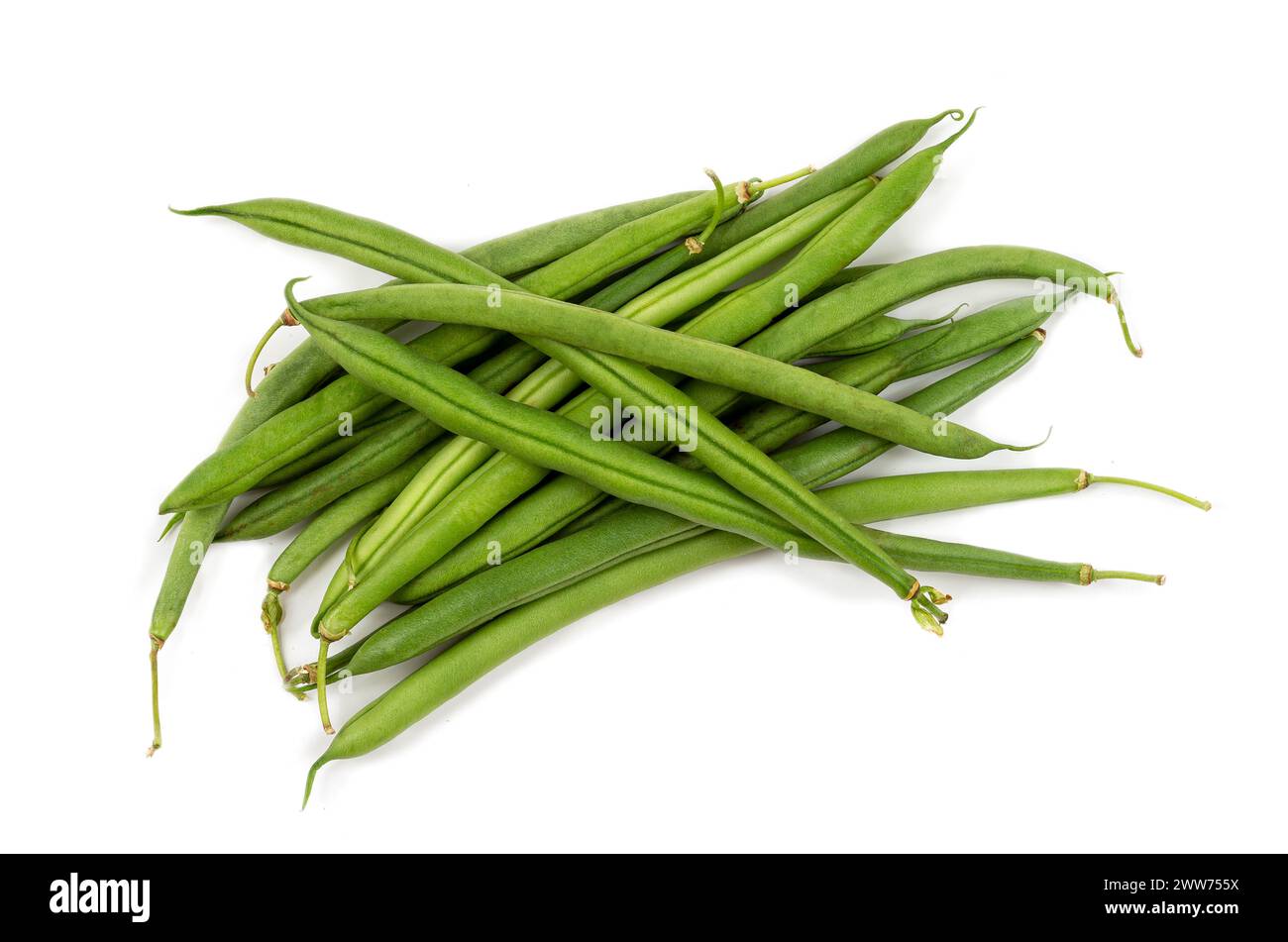 Handful of early green beans on a white background Stock Photo - Alamy