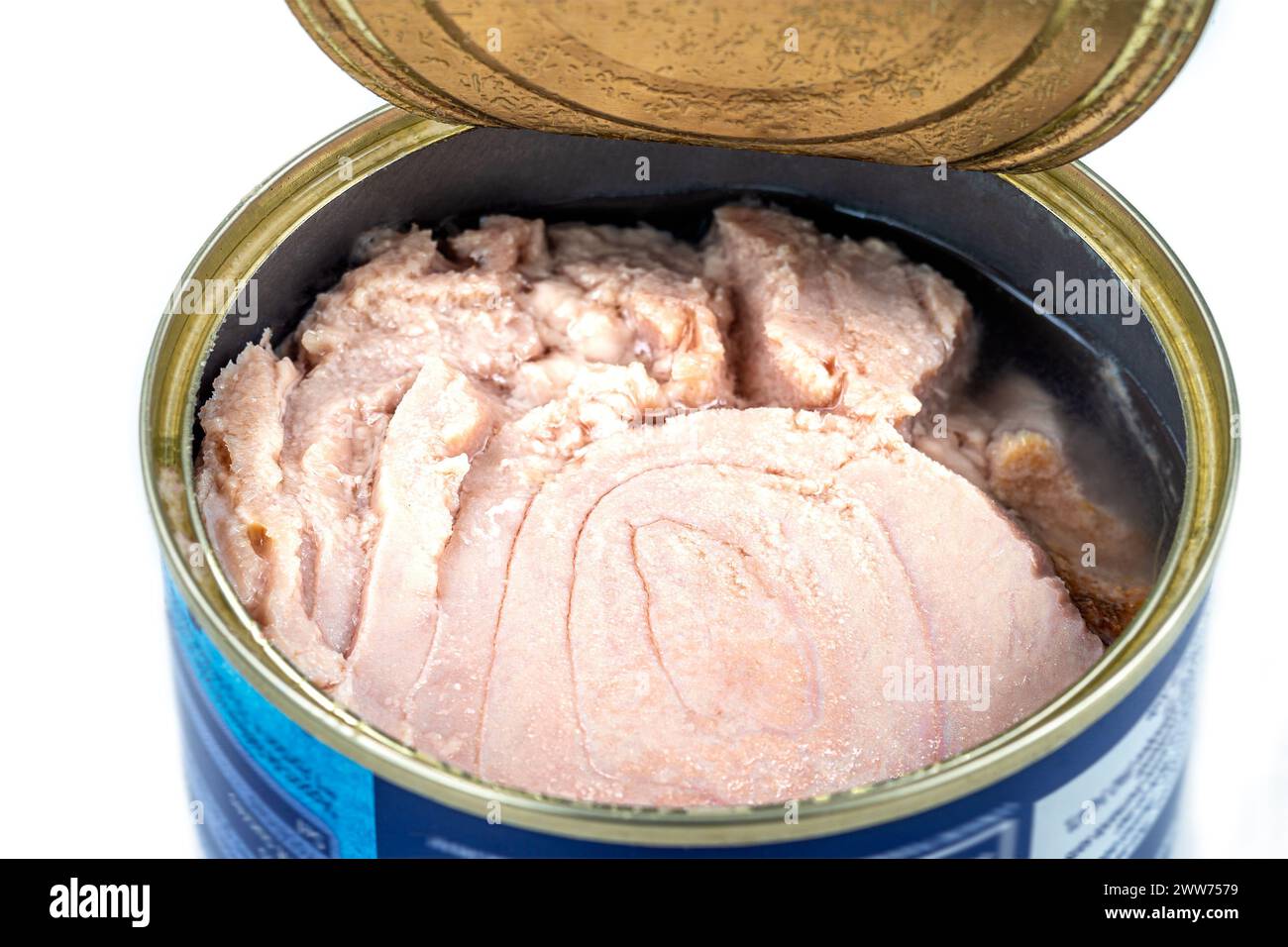 Open tuna can close up top view on white background Stock Photo - Alamy