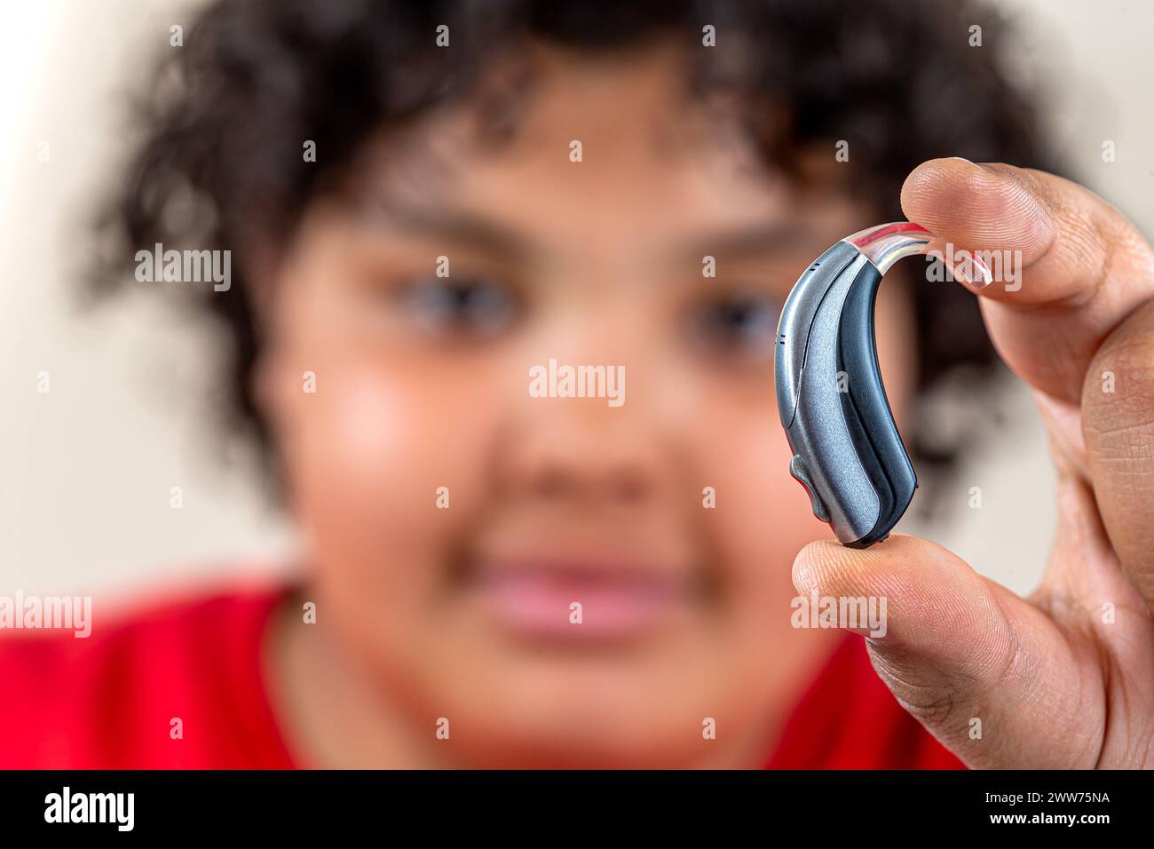 Boy hearing aid hi-res stock photography and images - Alamy