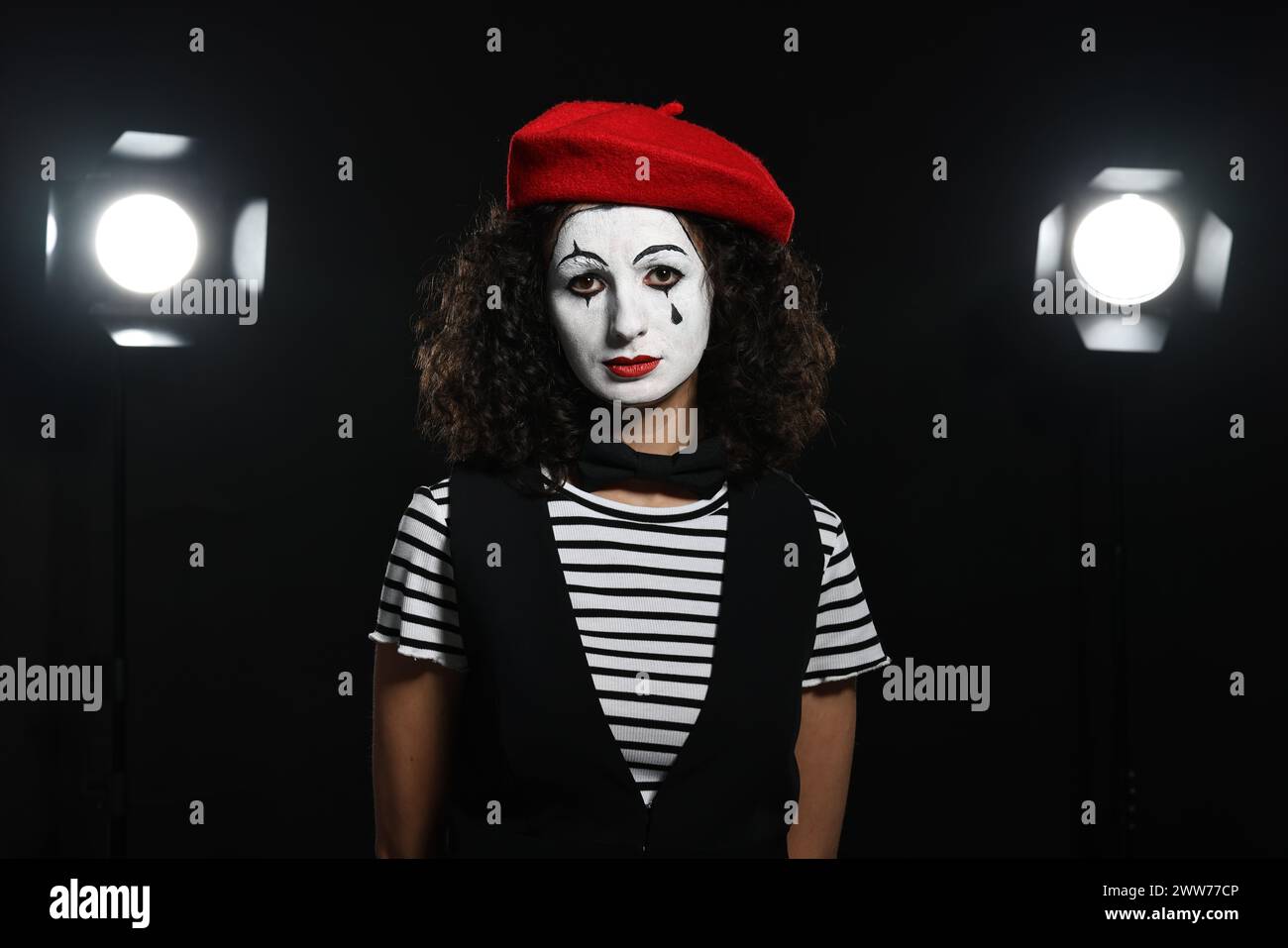 Young woman in mime costume performing on stage Stock Photo - Alamy