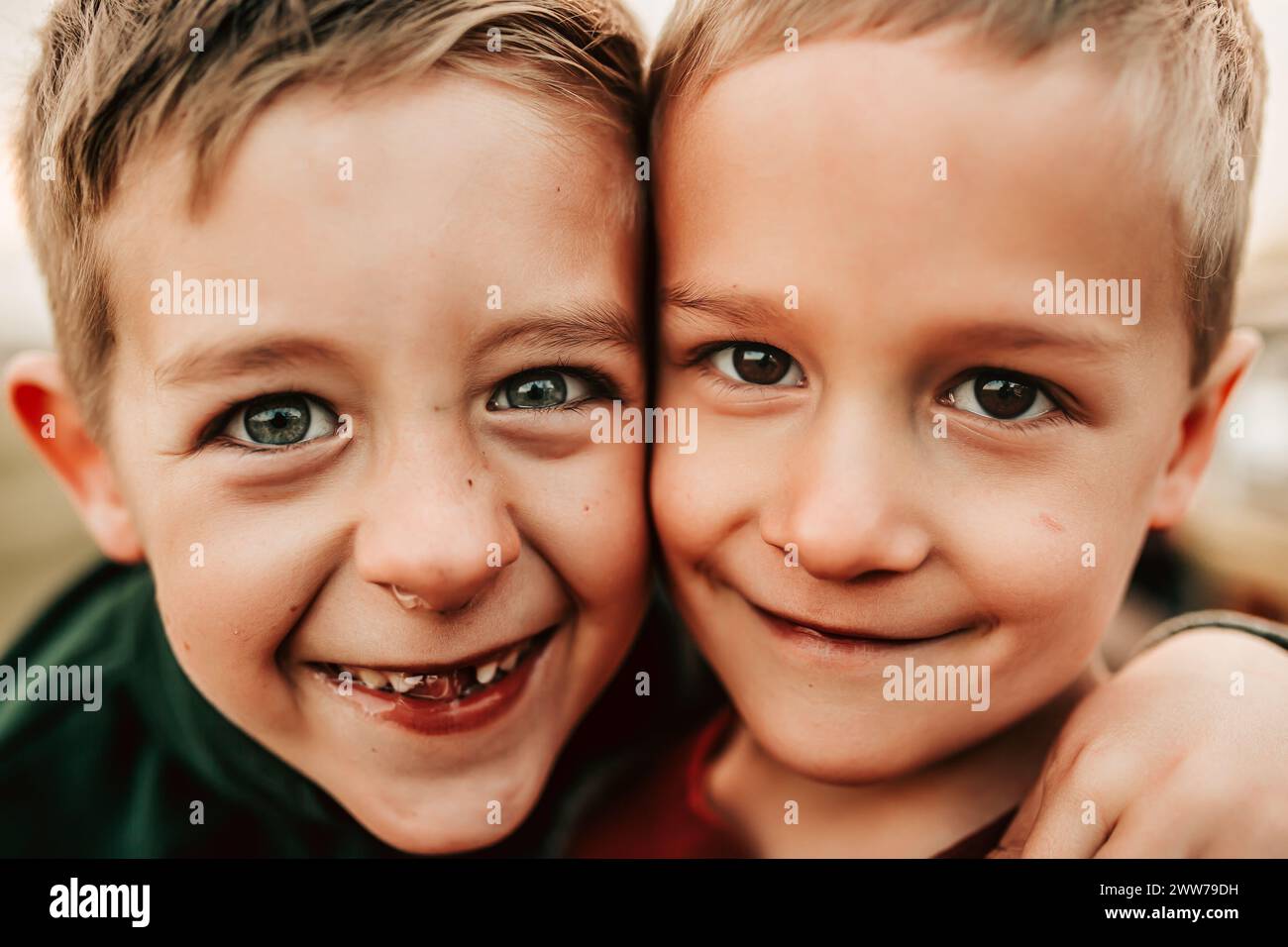 A closeup of two happy young boys' portrait Stock Photo - Alamy