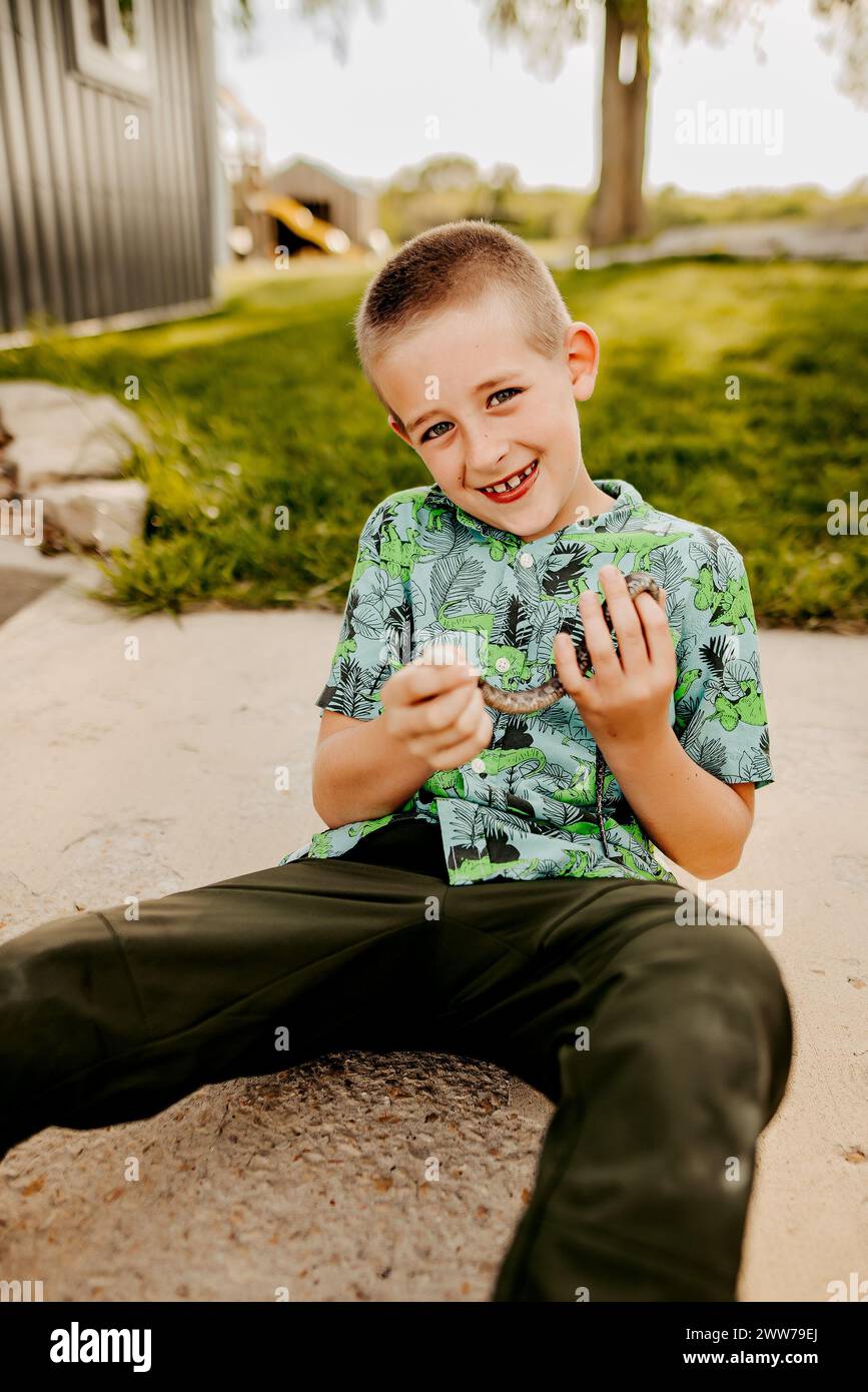 A young boy posing with a silly face Stock Photo - Alamy