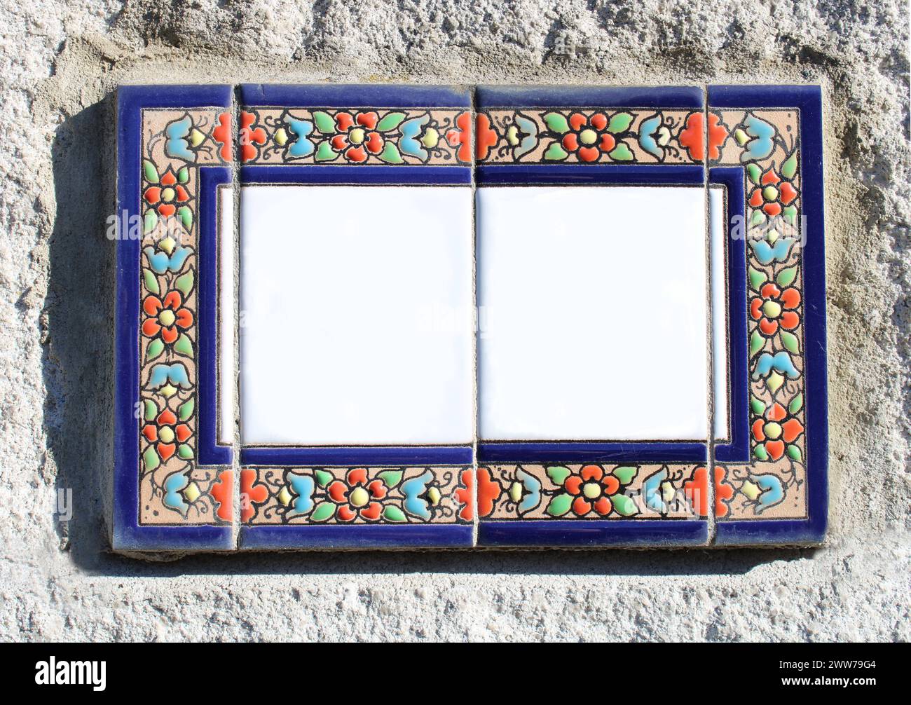 collage, pottery sign in enamel or clay on a rustic stone wall. blue ...