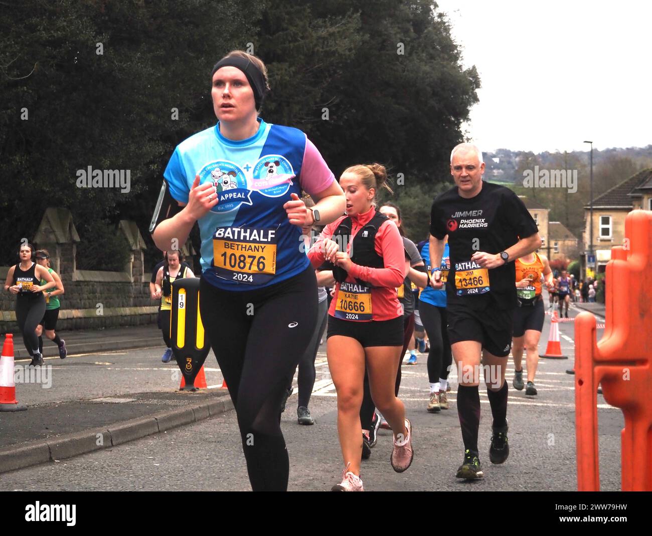 Runners in the Bath Half Marathon 2024 with one wearingThe Bristol ...