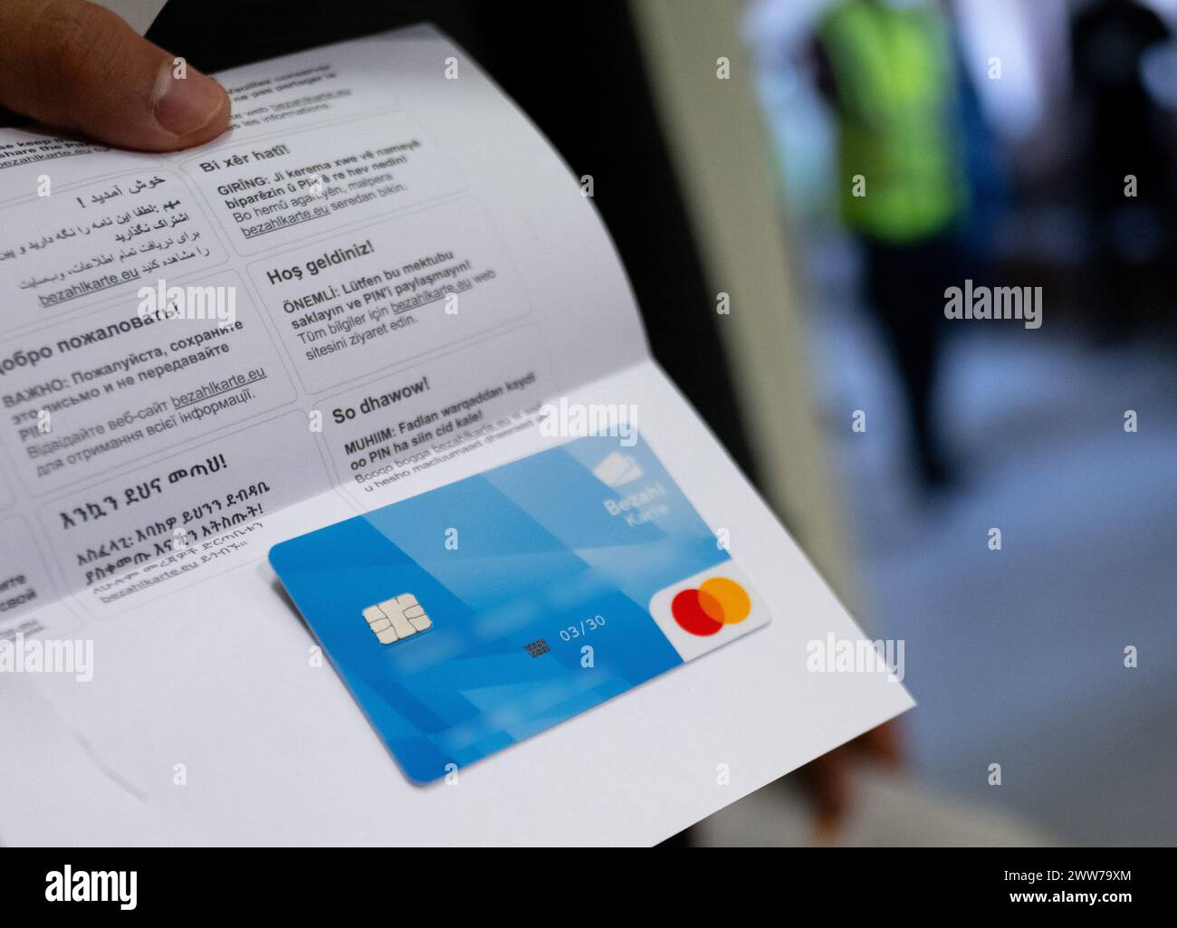 22 March 2024, Bavaria, Fürstenfeldbruck: An asylum seeker shows one of ...