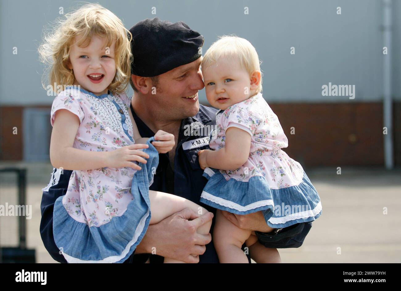 04/07/11.Pictured: Let Keith Ross is welcomed home by his daughters ...