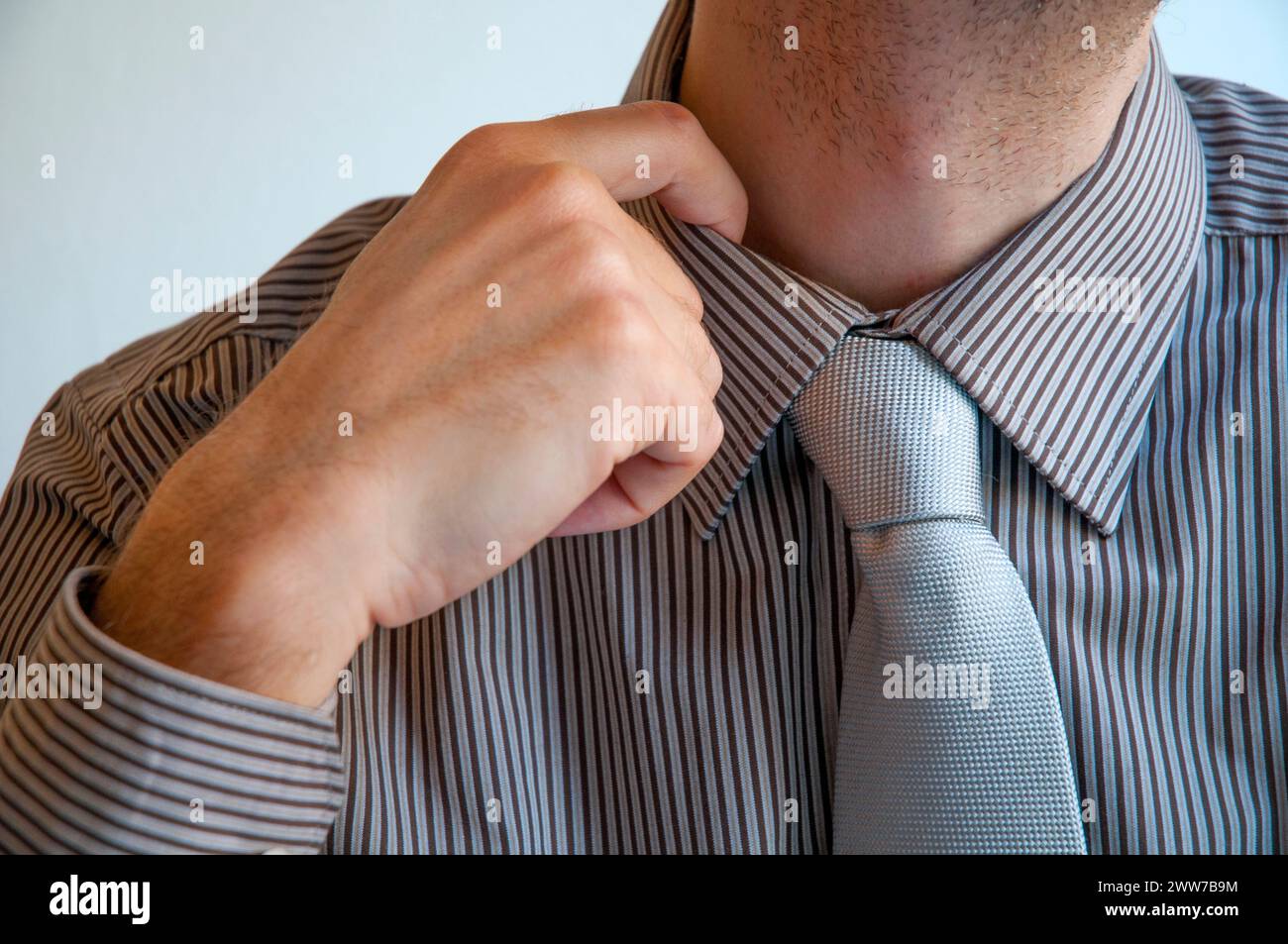 Hand strangling neck hi-res stock photography and images - Alamy