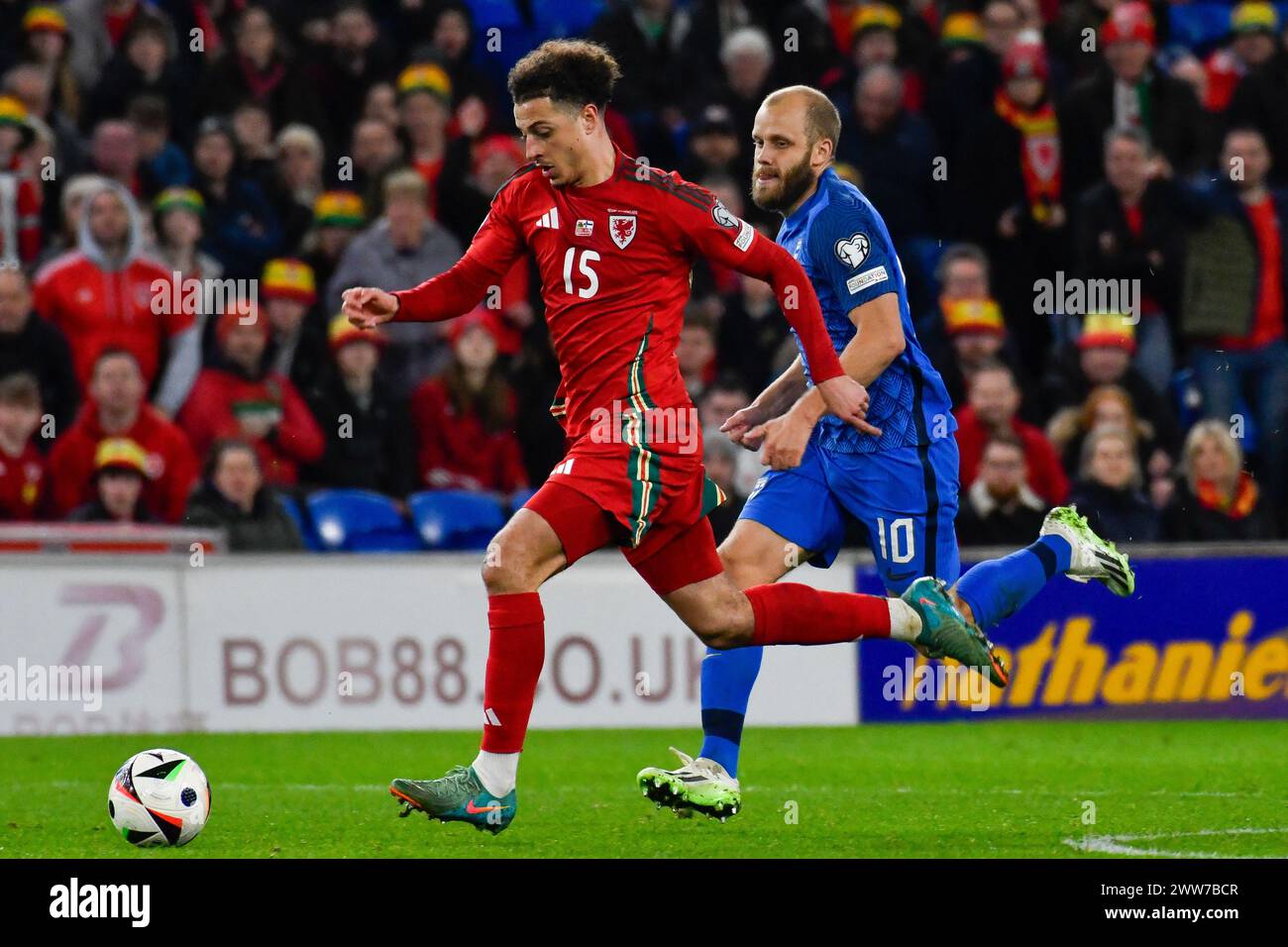 Cardiff, Wales. 21 March 2024. Ethan Ampadu of Wales under pressure ...