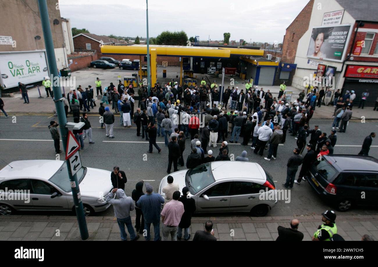 10/08/11...The Asian community pay their respects on Dudley Road ...