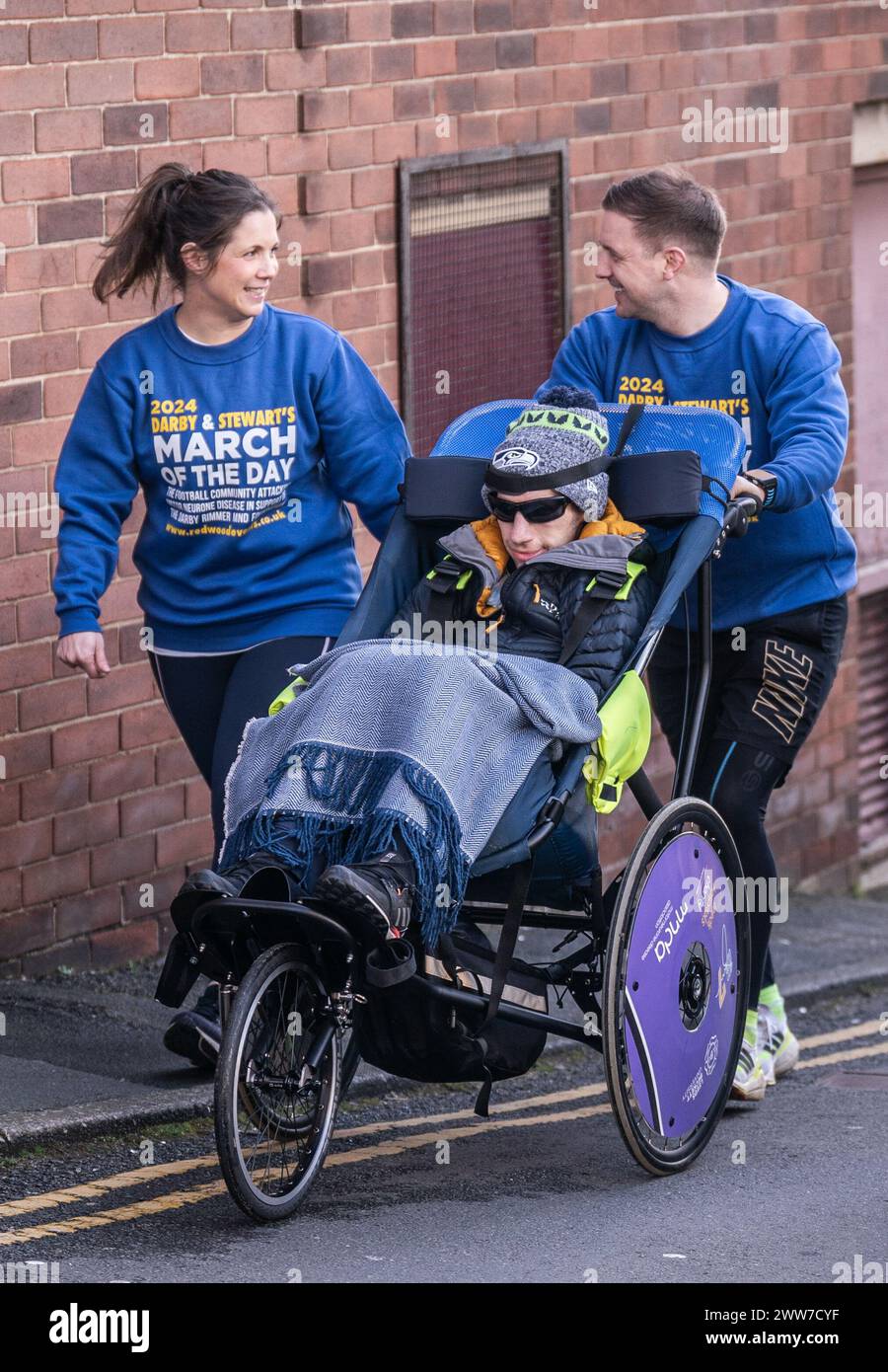 Former rugby player Rob Burrow (centre) with his wife Lindsey Burrow ...
