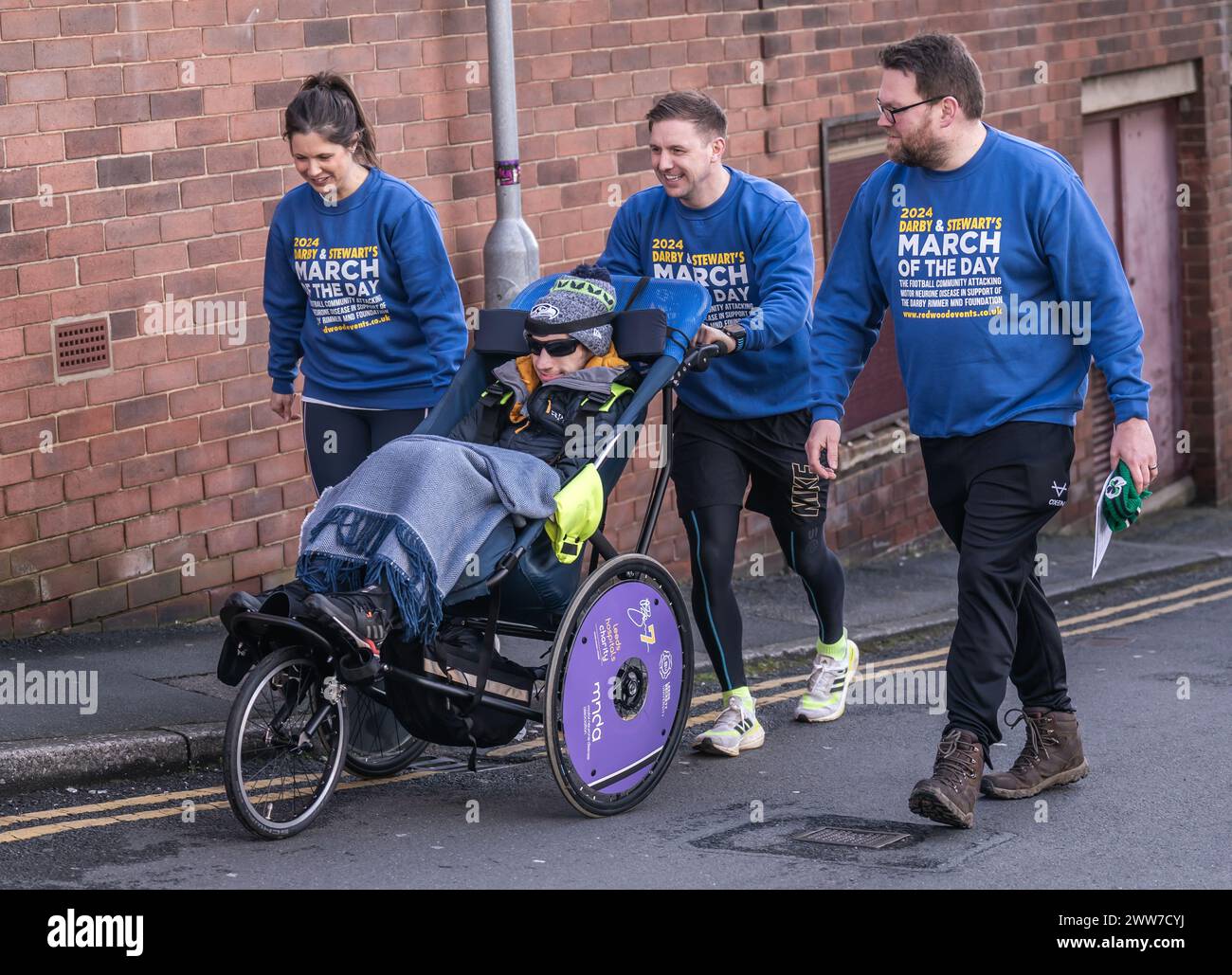 Former rugby player Rob Burrow (second left) with his wife Lindsey ...