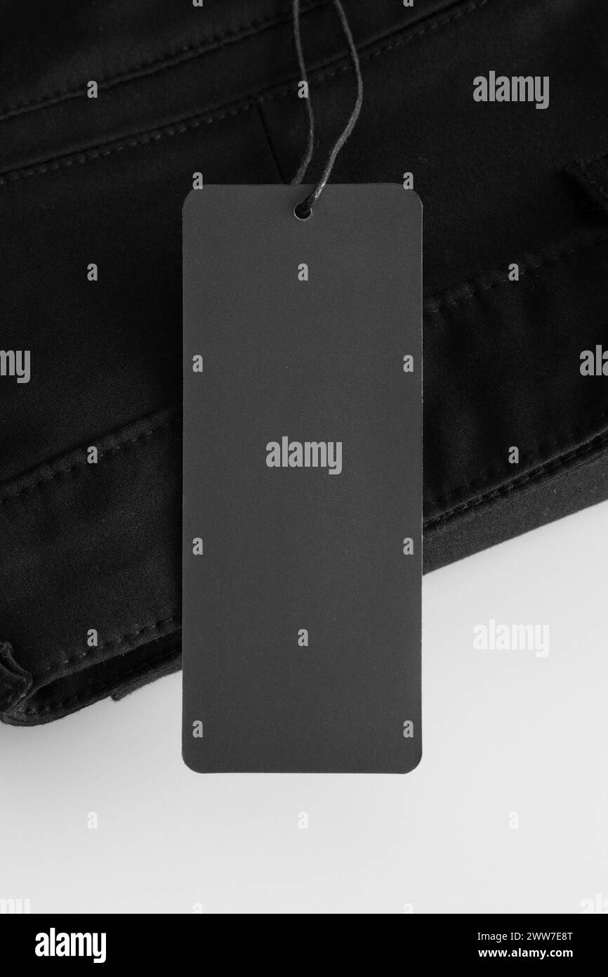 Black tag mockup on a pants Stock Photo - Alamy
