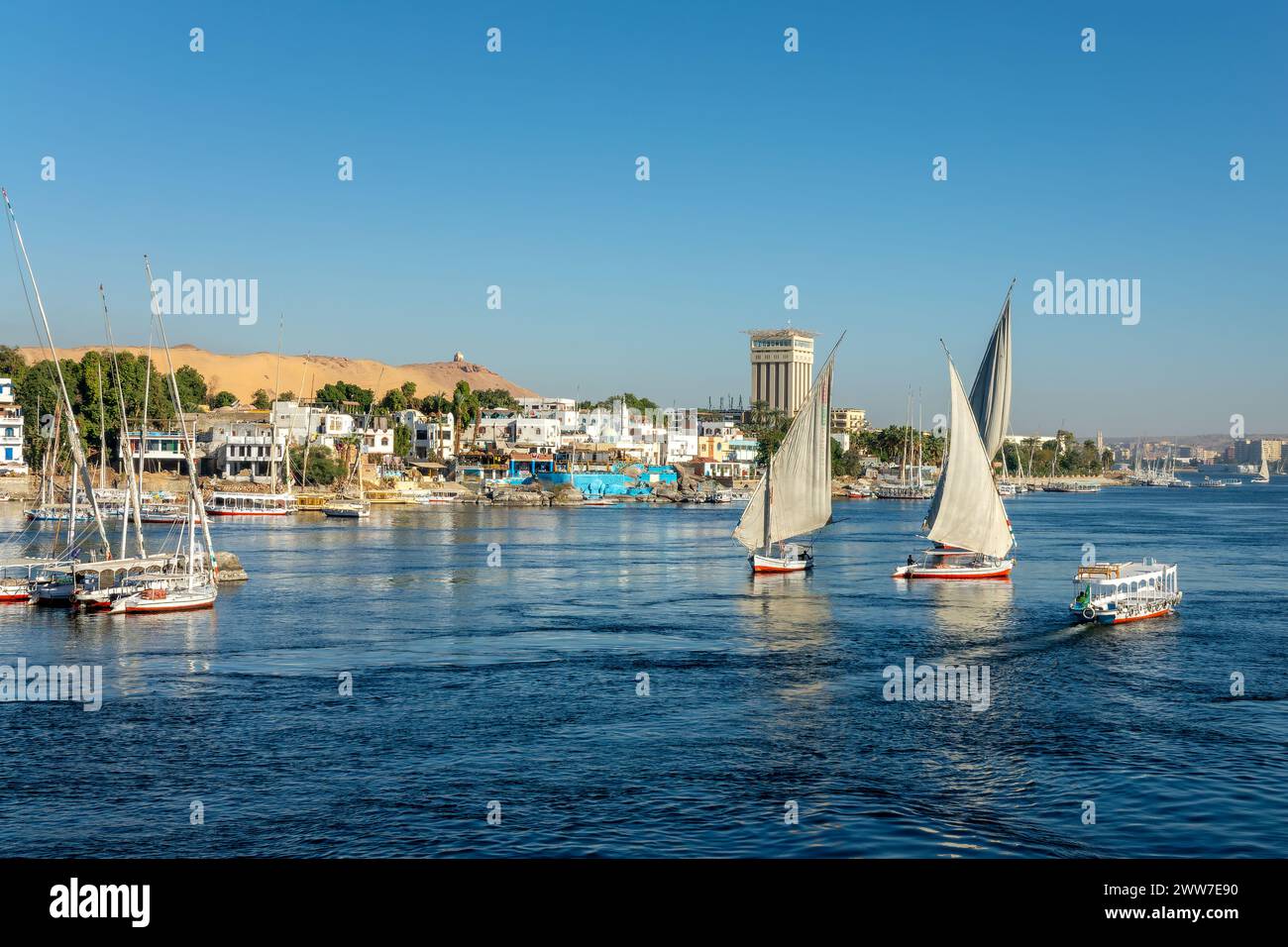 Feluccas (traditional egyptian sailing boats) on the Nile river in ...