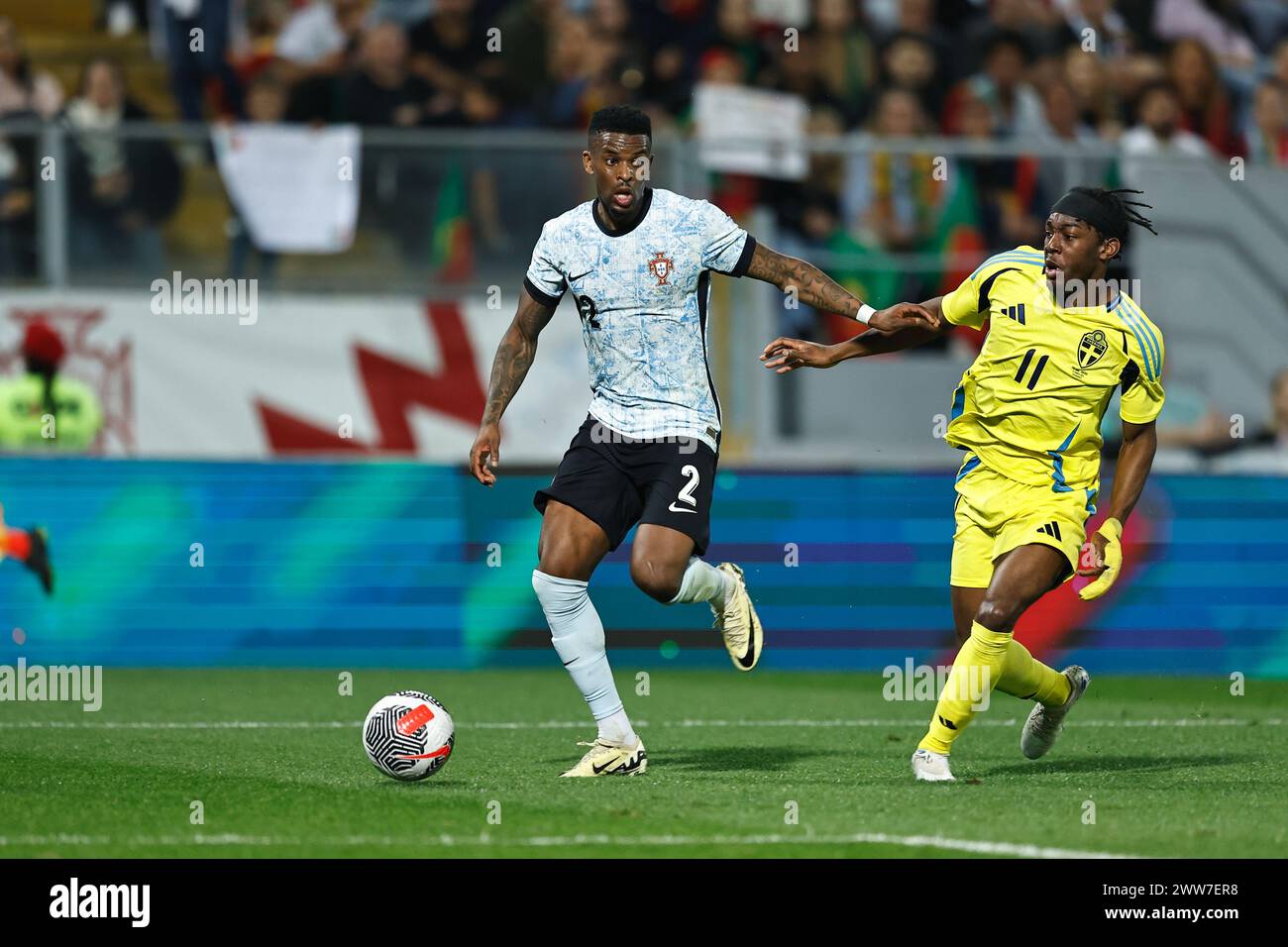Guimaraes, Portugal. 21st Mar, 2024. (L-R) Nelson Semedo (POR), Anthony ...