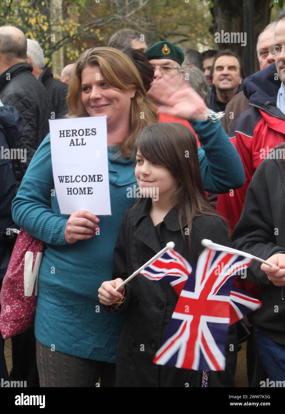 22/11/11. ..Crowds line the streets of Northampton to welcome home 9th ...