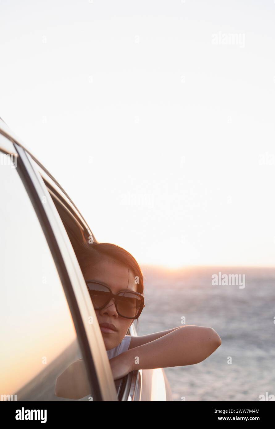 Indian woman looking outside window hi-res stock photography and images ...