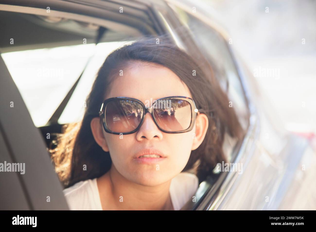 Indian woman looking outside window hi-res stock photography and images ...