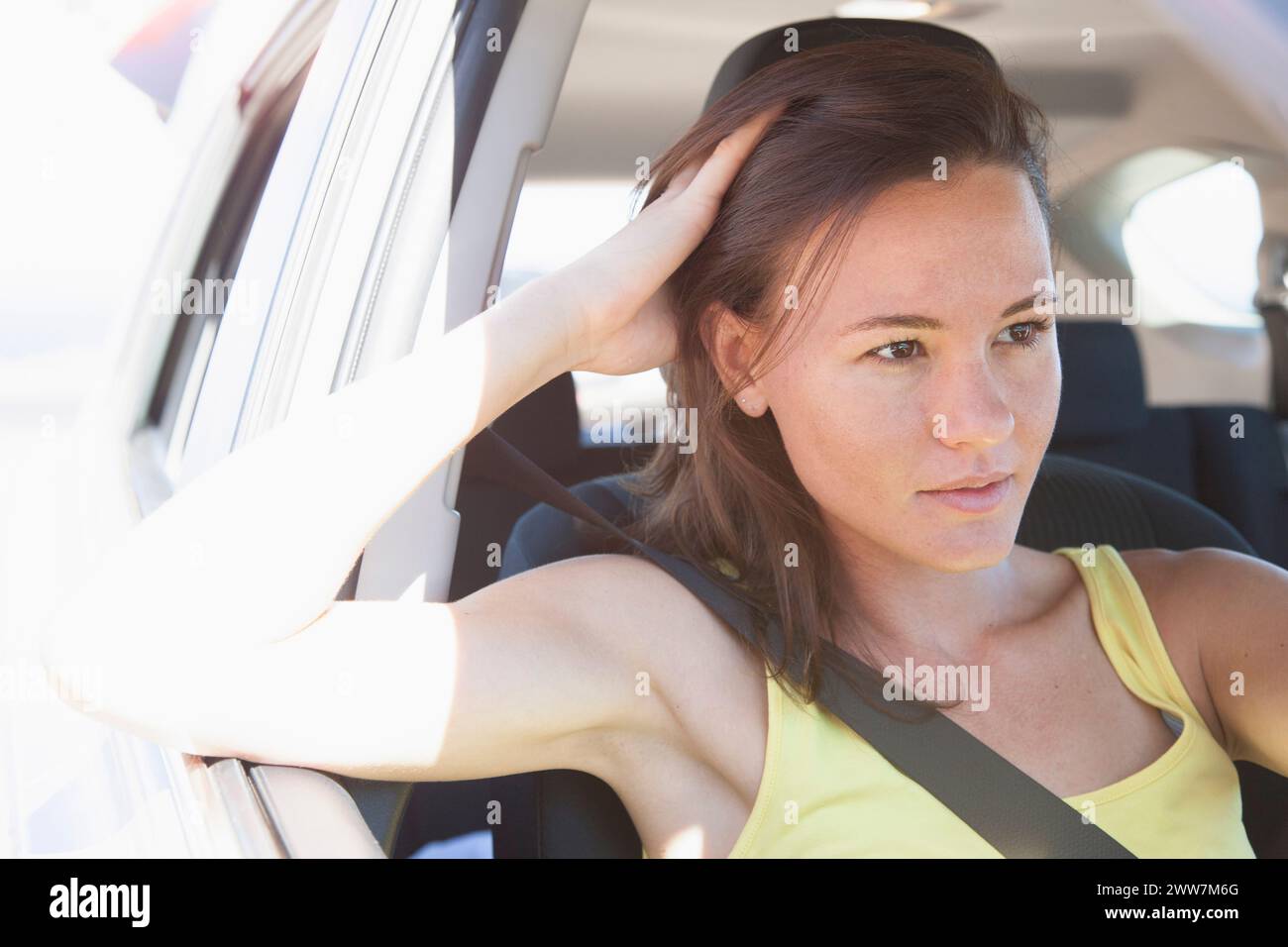 Woman wearing seat belt hi-res stock photography and images - Alamy