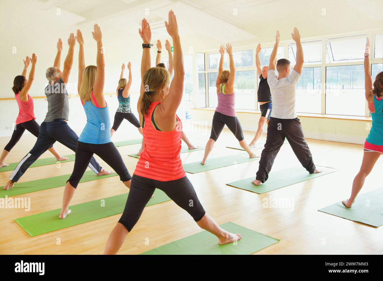 Group of People at Yoga Class Stock Photo - Alamy