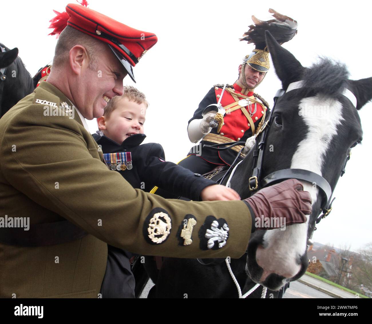 24/11/11. ..Proudly wearing his dad's medals, Carl Saul (5) is ...