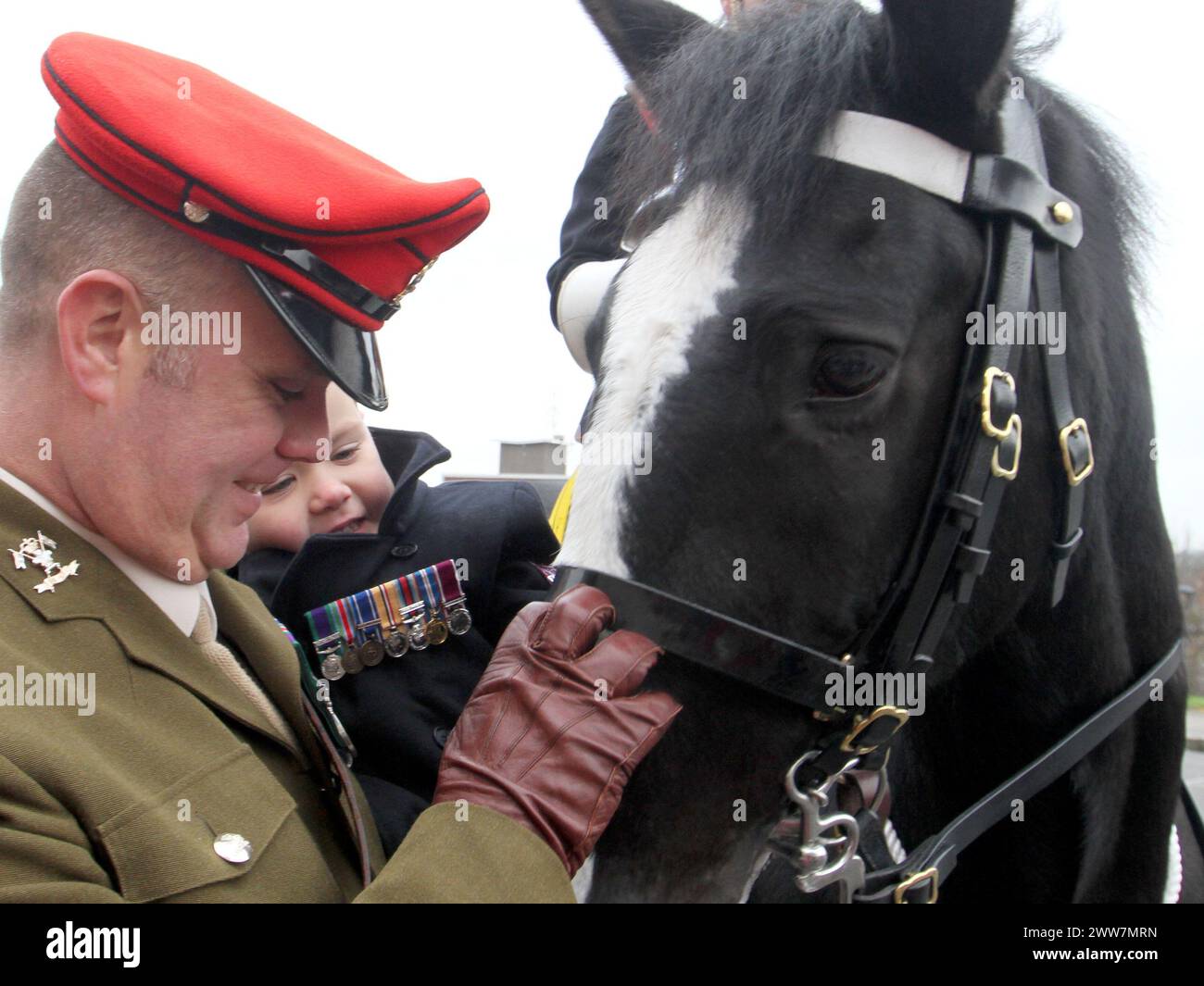 24/11/11. ..Proudly wearing his dad's medals, Carl Saul (5) is ...