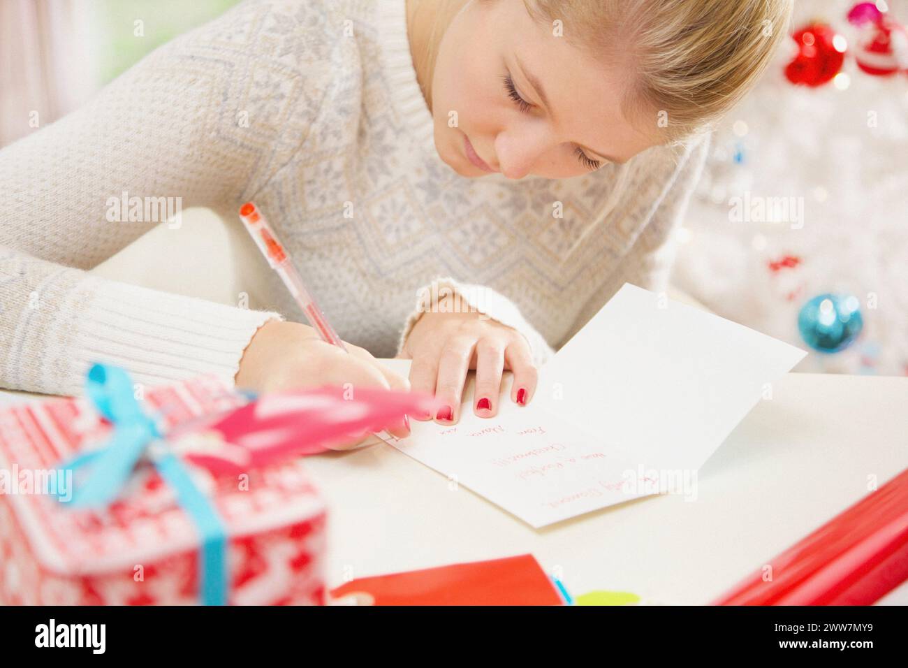 Christmas card woman pen hi-res stock photography and images - Alamy