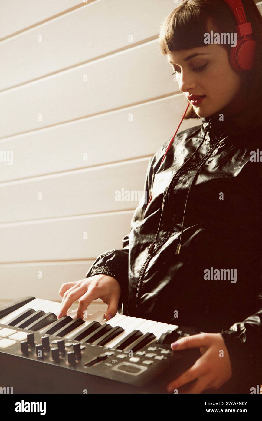 Teenage Girl Playing Synthesizer Stock Photo - Alamy