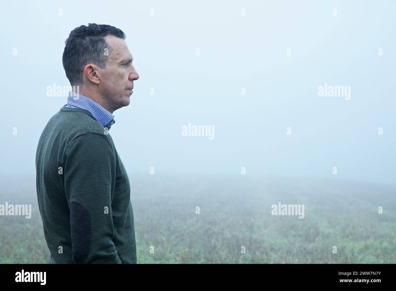 Middle aged individual standing outdoors hi-res stock photography and ...