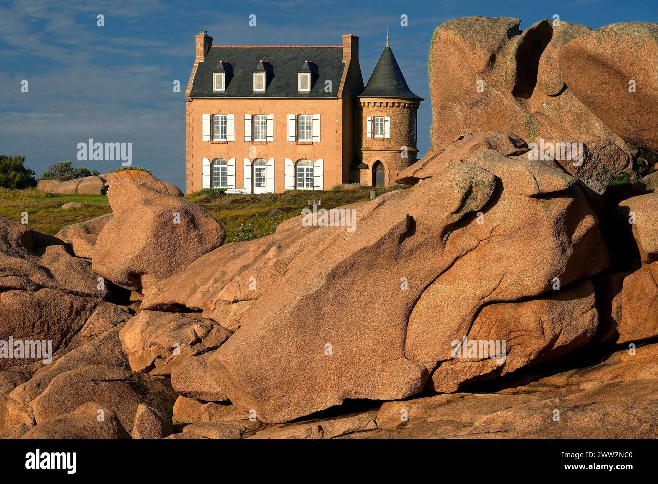 Small castle between red rocks, Brittany, France Stock Photo - Alamy
